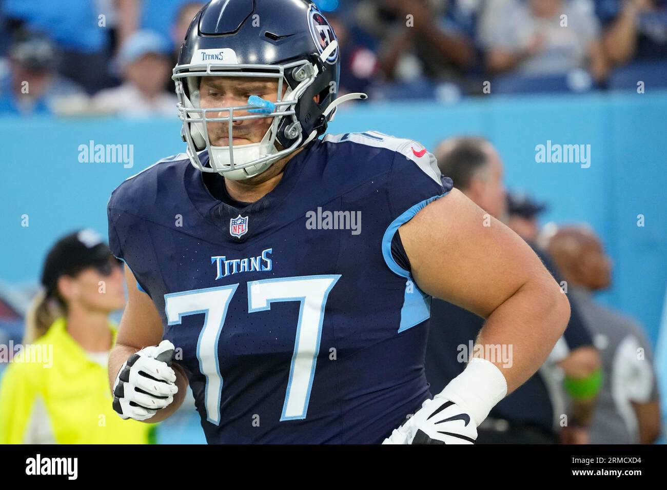 Tennessee Titans offensive lineman Peter Skoronski (77) runs onto the ...