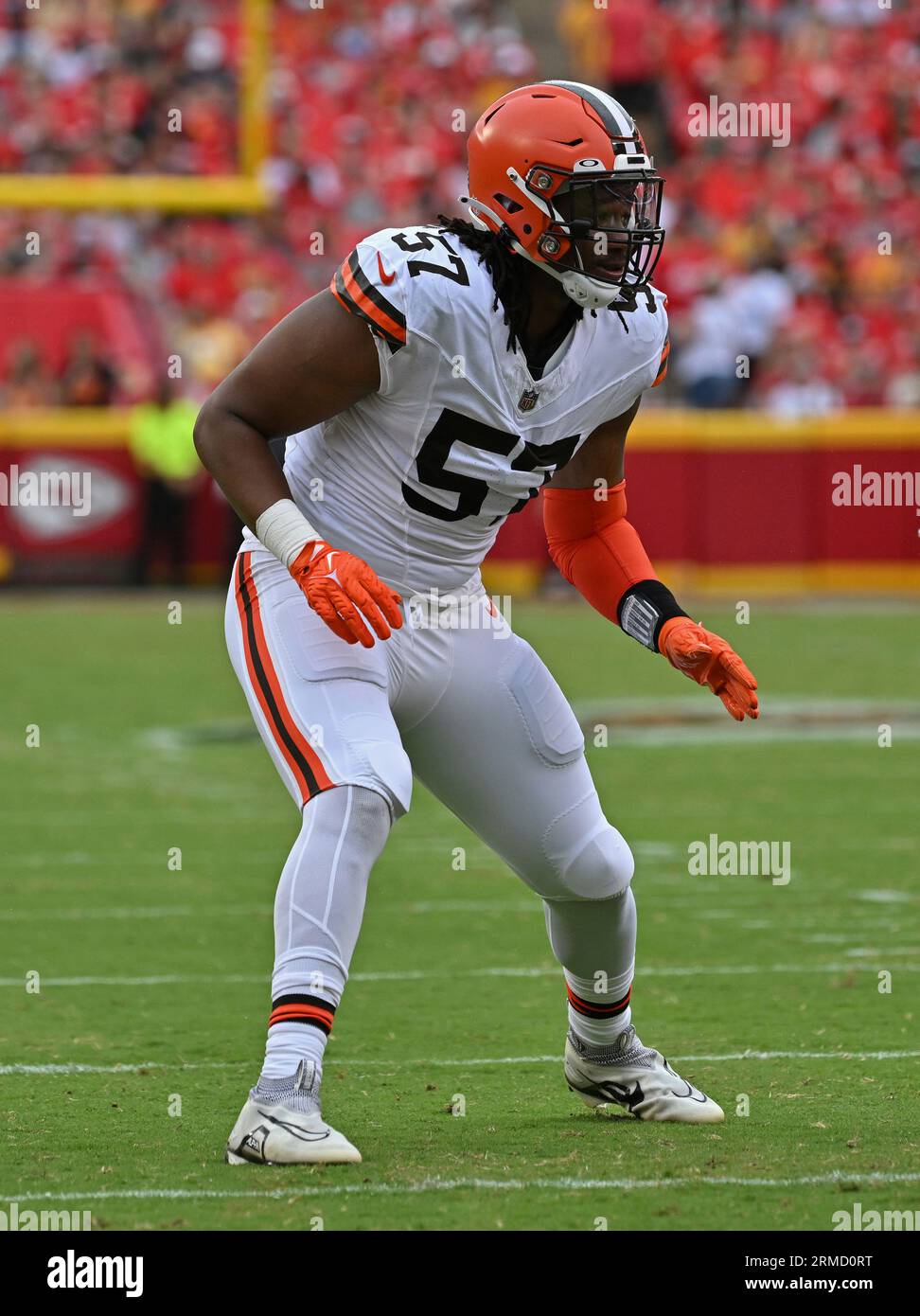 Cleveland Browns defensive end Isaiah McGuire (57) gets set for a play ...