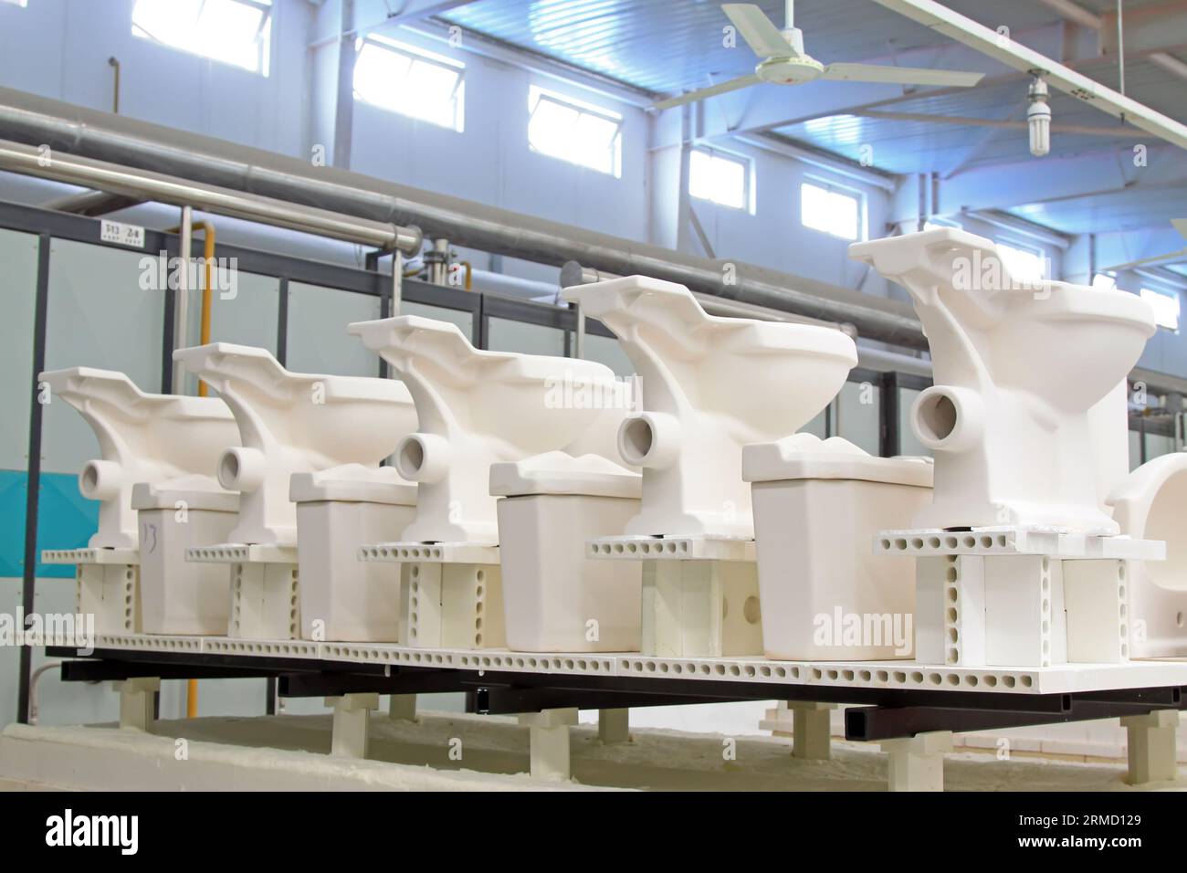 Ceramic toilet products, in a workshop production line Stock Photo - Alamy