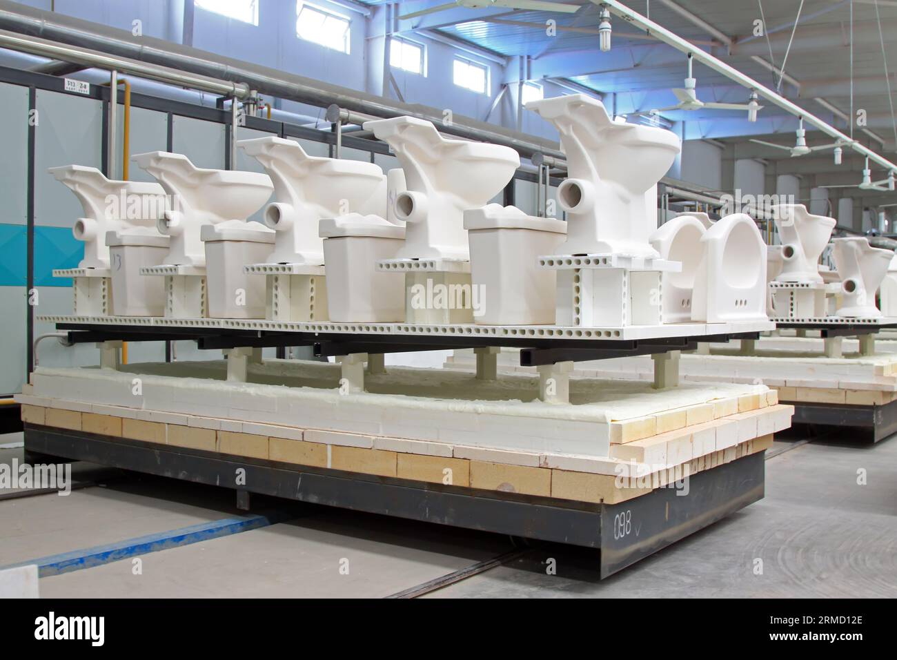 Ceramic toilet products, in a workshop production line Stock Photo - Alamy