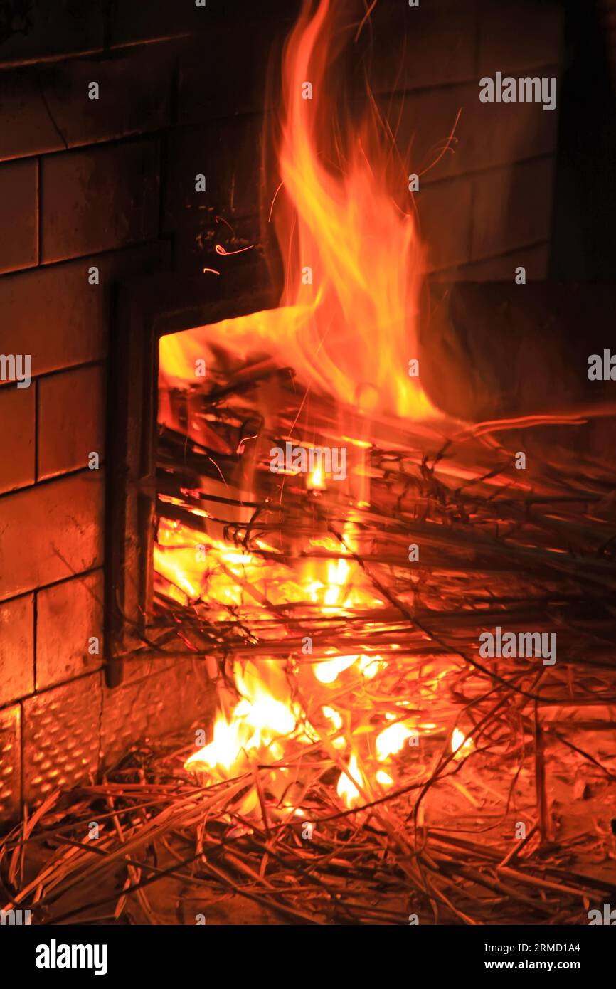 Burning straw in the primitive ovens, Chinese rural areas Stock Photo ...