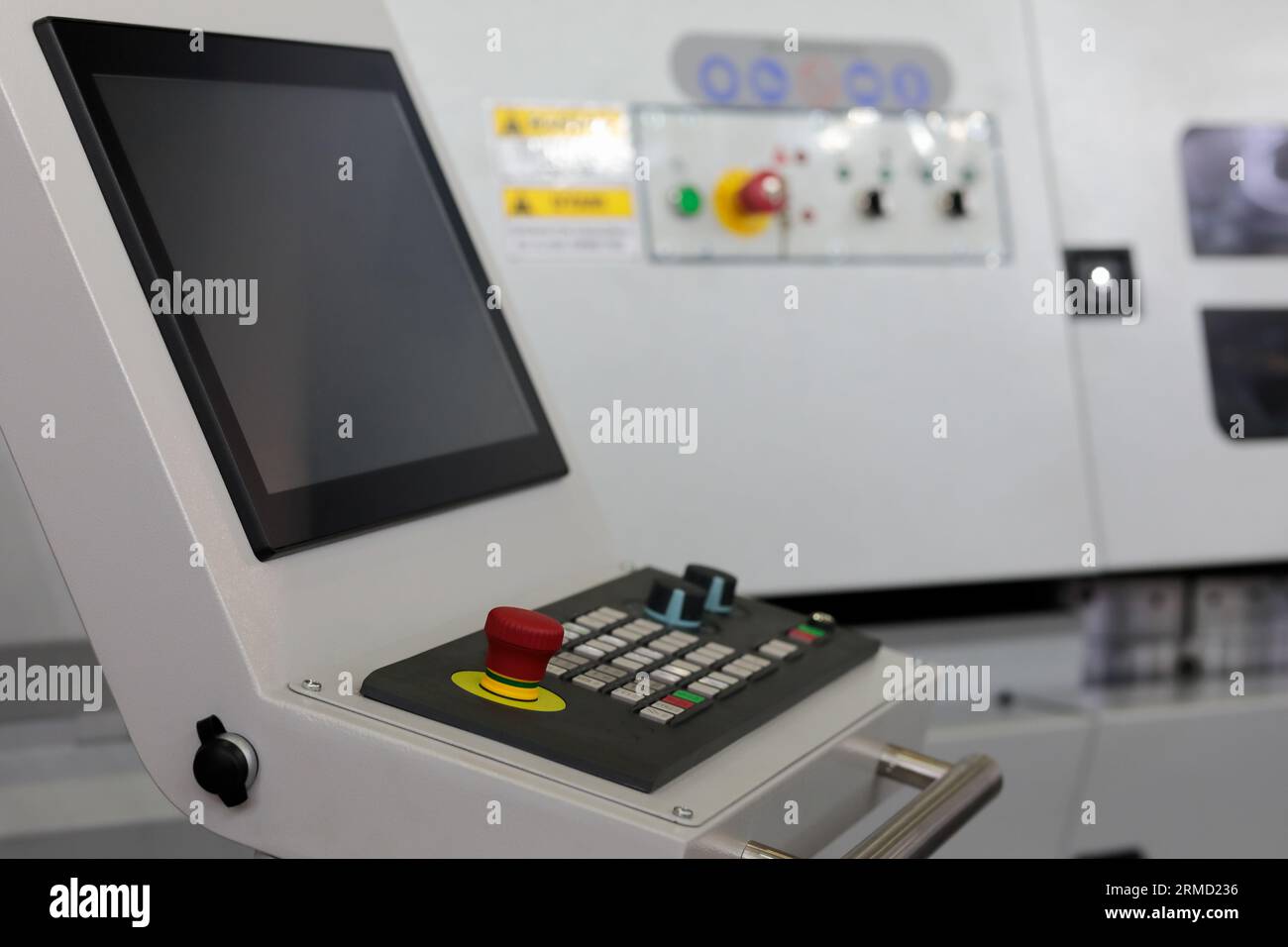 CNC control console of modern industrial equipment. Selective focus ...