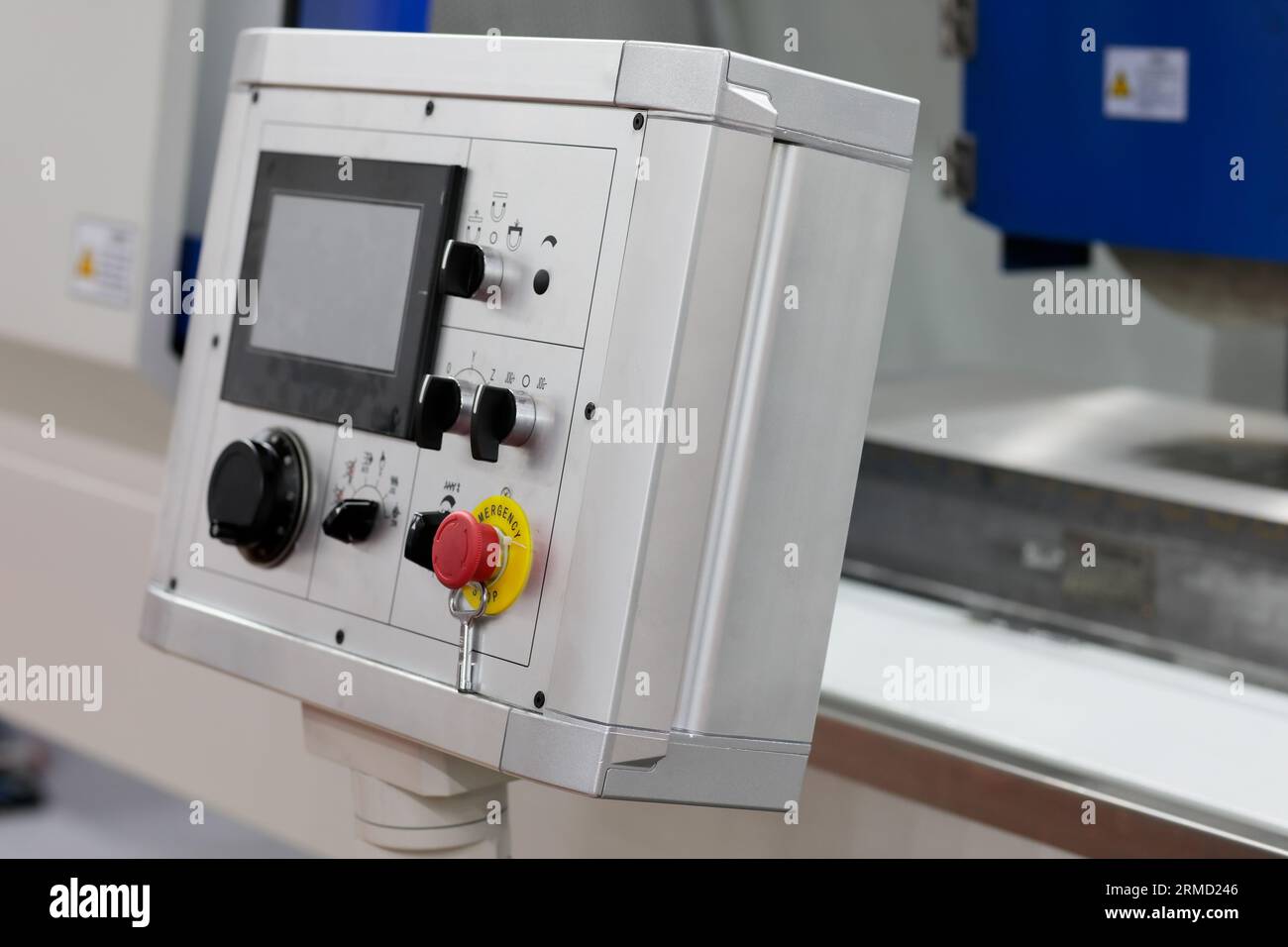 CNC control console of automated surface grinder machine. Selective ...