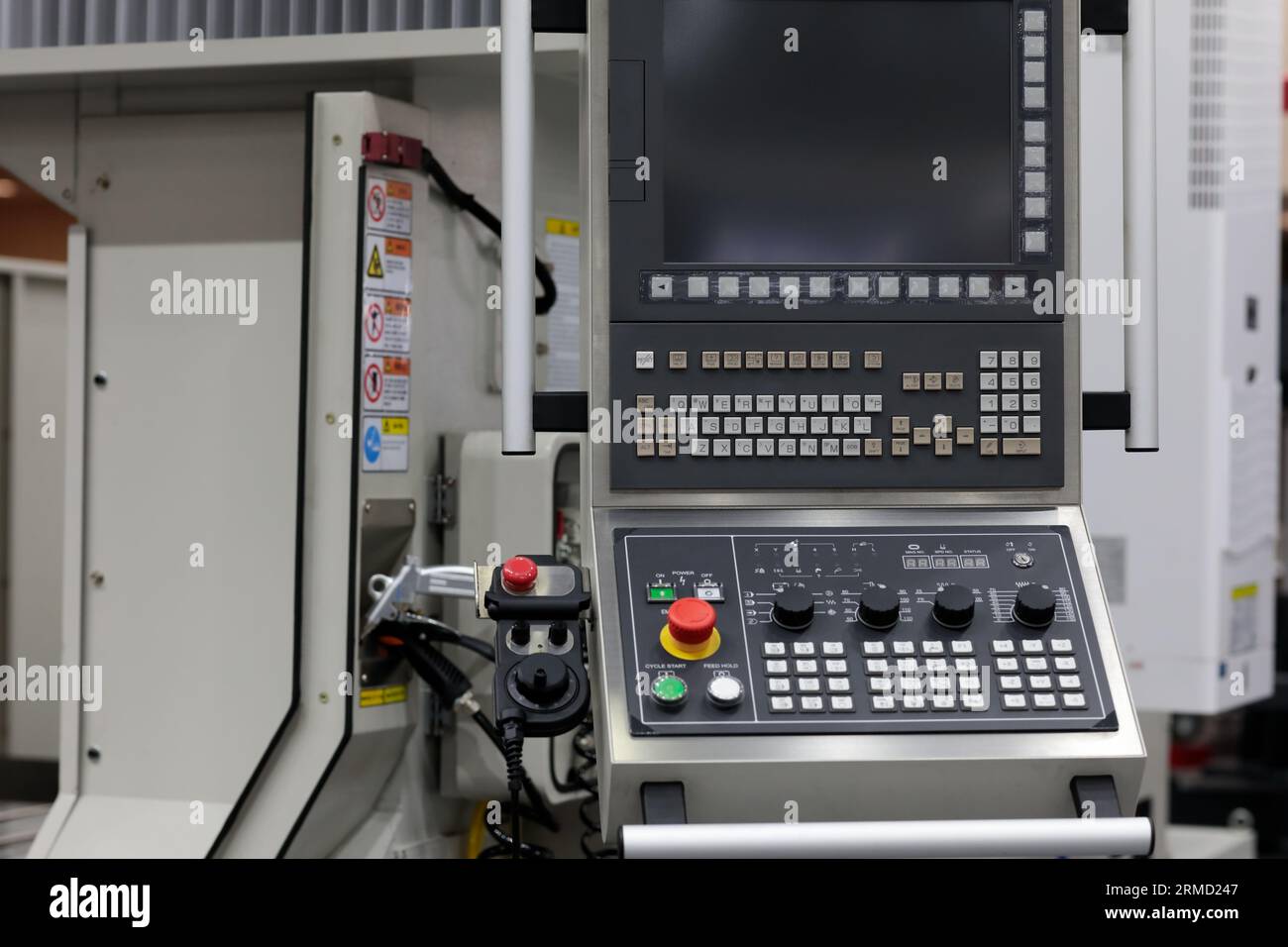Control console of 5 axis CNC machining center. Selective focus Stock ...