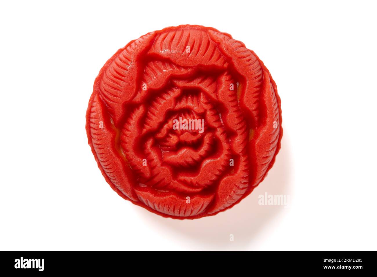 top view trendy and beautiful flower shape red moon cake on a white ...