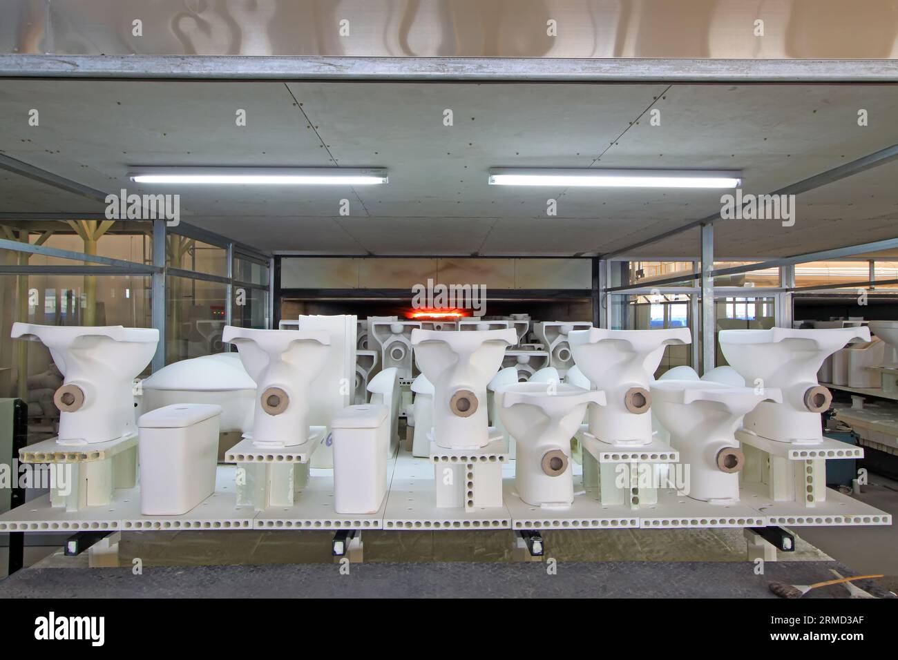 ceramic toilet products in a workshop production line Stock Photo - Alamy