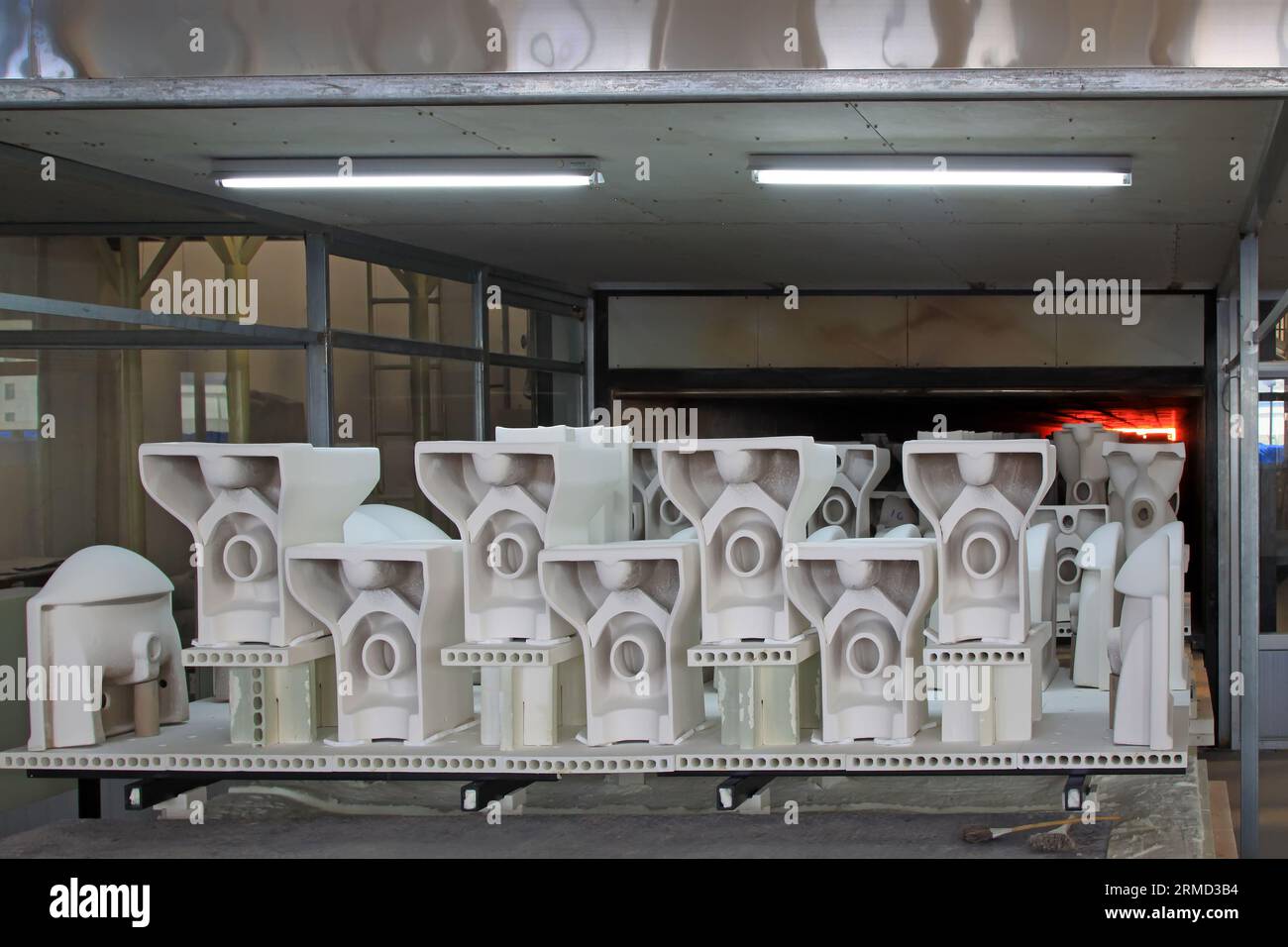 ceramic toilet products in a workshop production line Stock Photo - Alamy