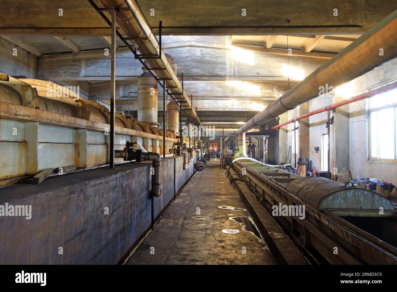Iron and steel parts removal rust production line in a factory Stock Photo - Alamy