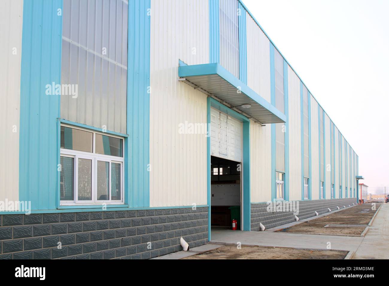 door of a warehouse, in manufacturing building exterior Stock Photo - Alamy