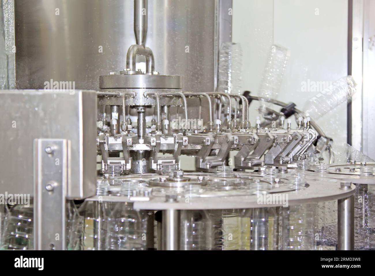 bottled mineral water production line in a factory Stock Photo - Alamy