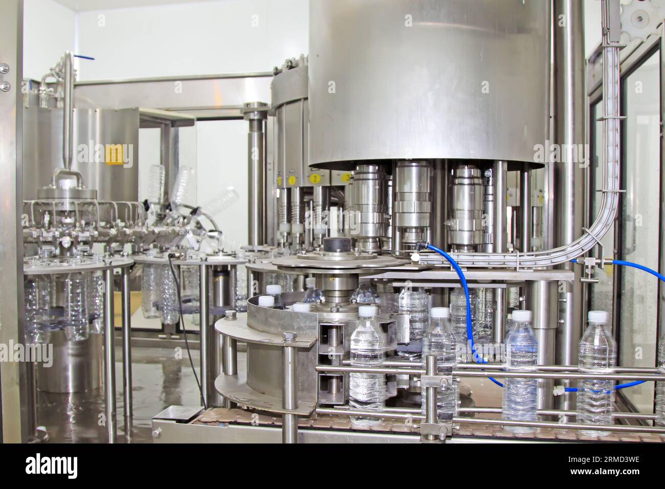 bottled mineral water production line in a factory Stock Photo - Alamy