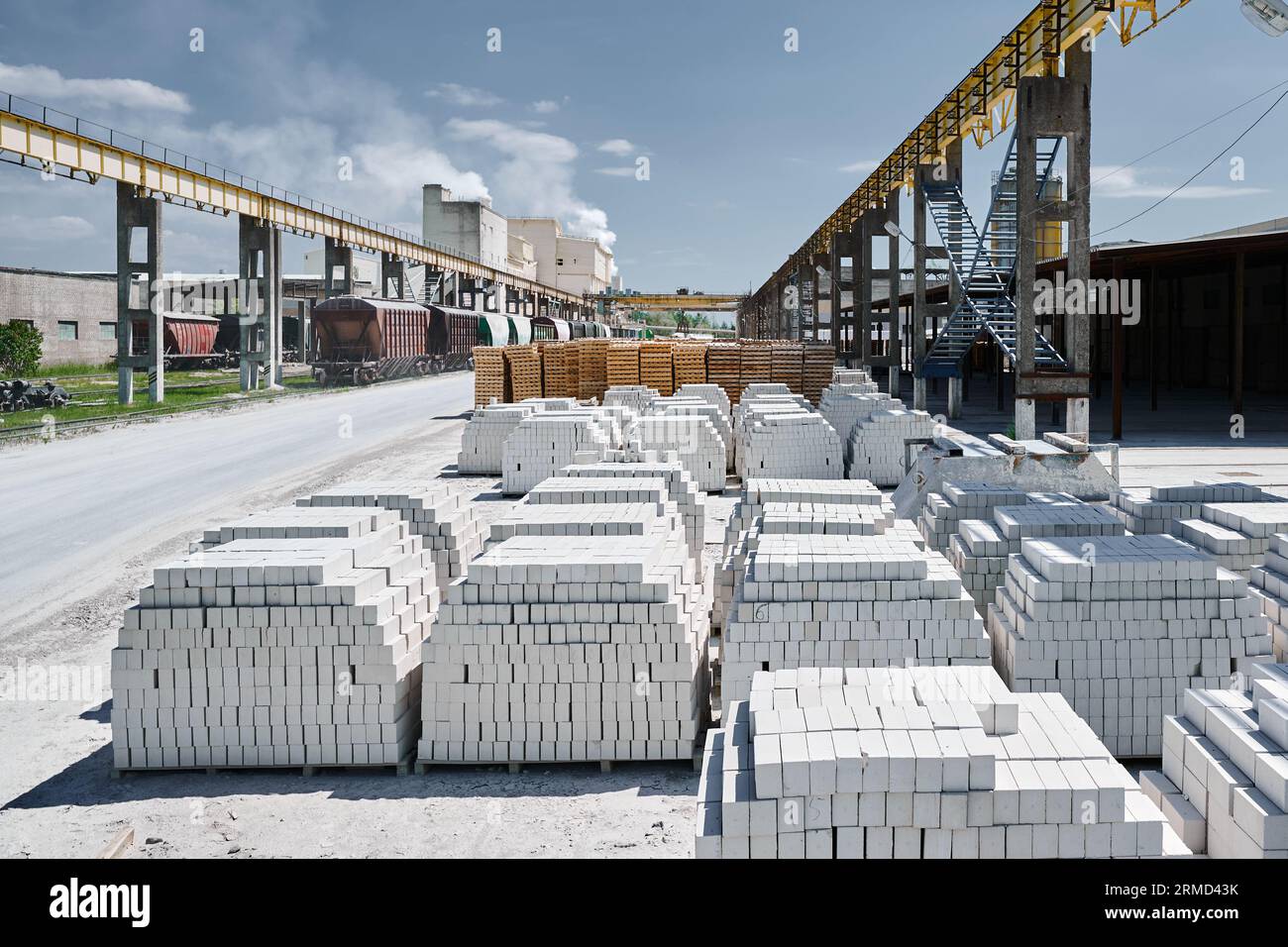 Factory warehouse of finished silica bricks put in rows Stock Photo - Alamy