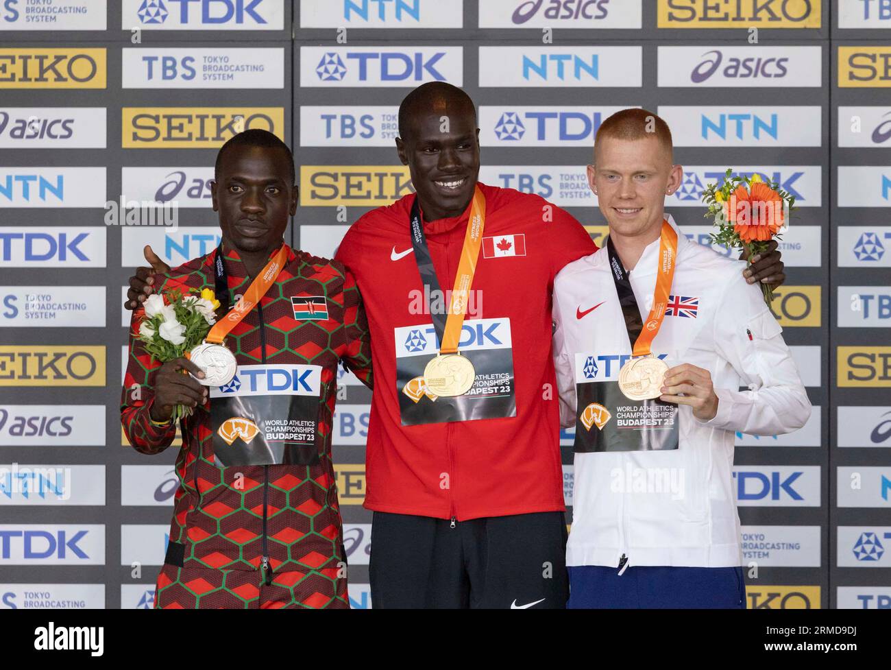 Budapest, Marco Arop (C) of Canada and bronze medalist Ben Pattison of ...