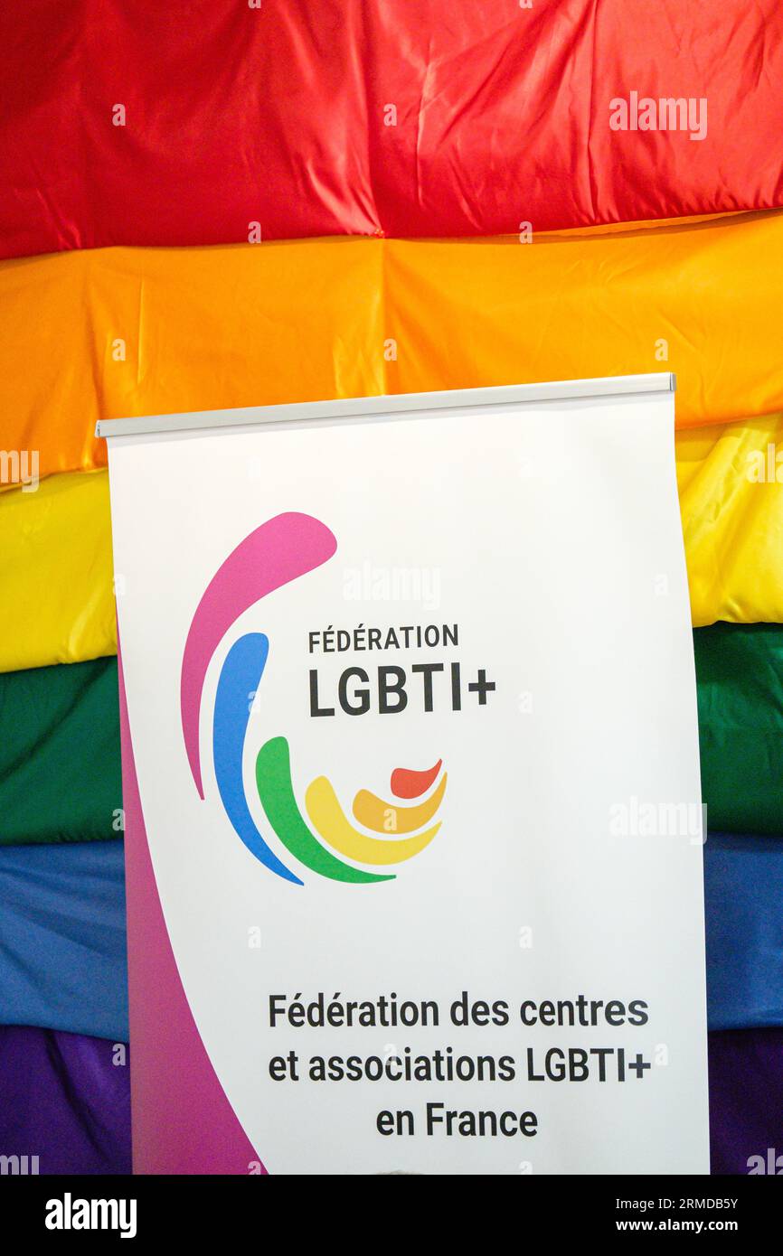 Logo of the LGBTI+ federation in front of the colours of the rainbow ...