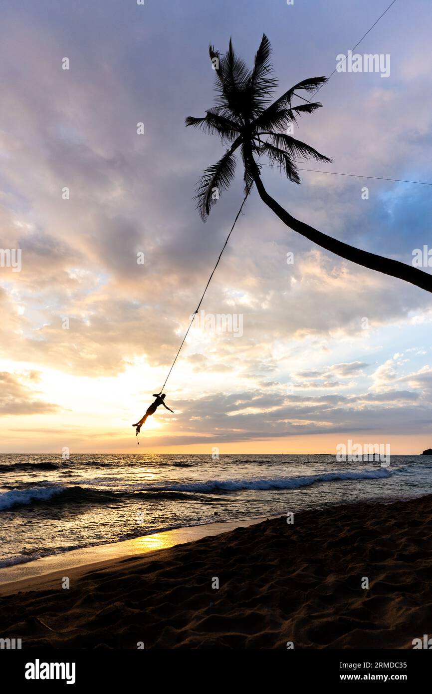 Palm tree swing above ocean at Dalawella Beach, Unawatuna, Sri Lanka ...
