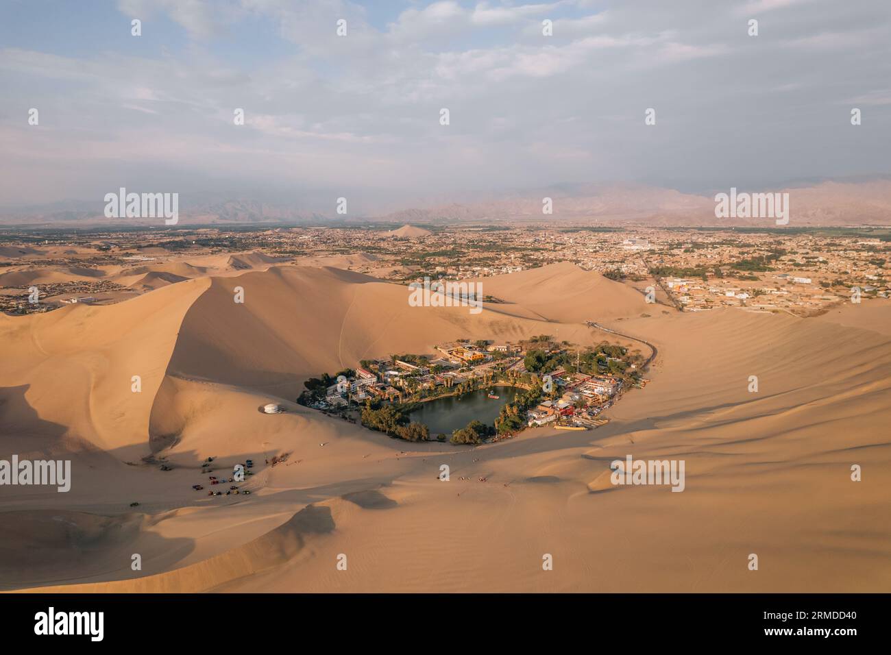 Aerial sunset photo of desert oasis Huacachina, Ica, Peru, South ...
