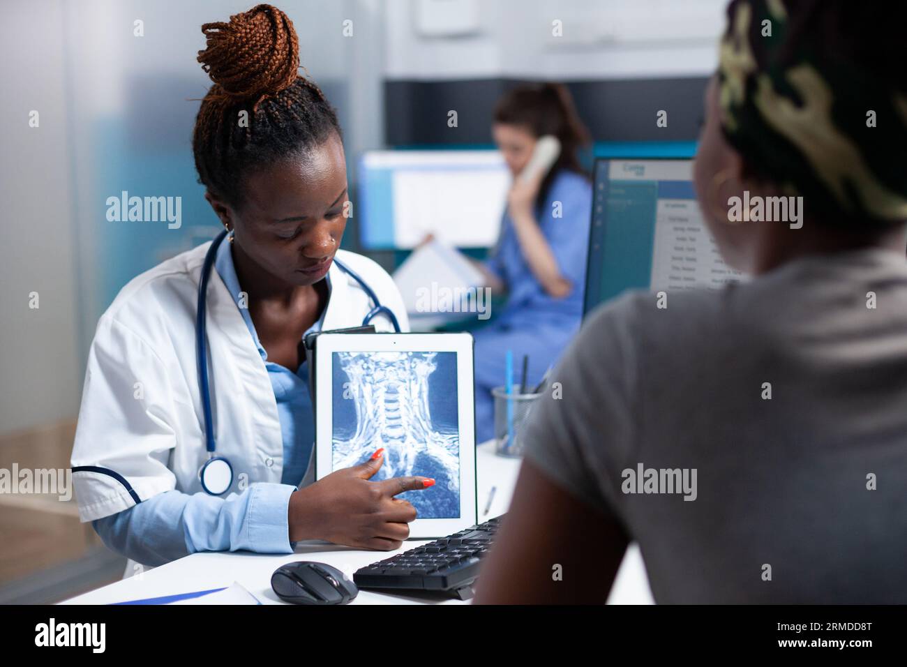 Radiologist showing x-ray ct lung scan explaining clinical information ...