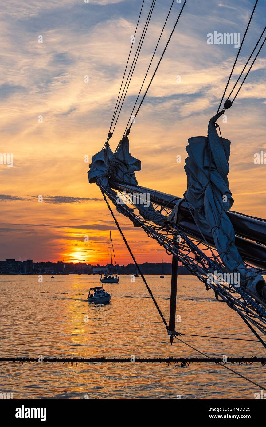 Sailing Ships On The Warnow River In The Sunset During The Hanse Sail ...