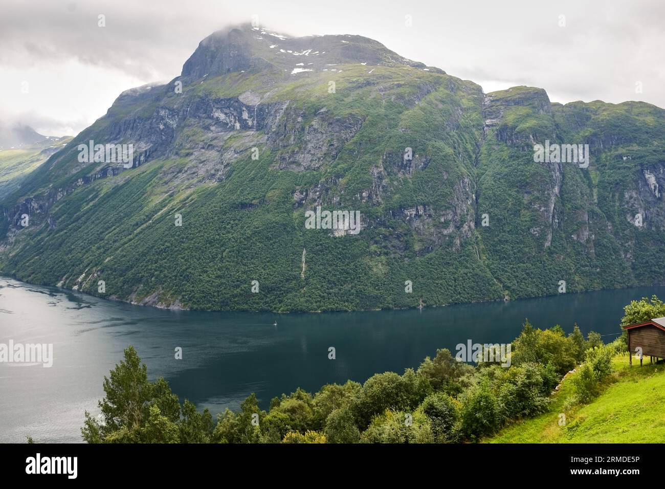 Geirangerfjord in Norway. Fjord is surrounded by majestic mountains ...