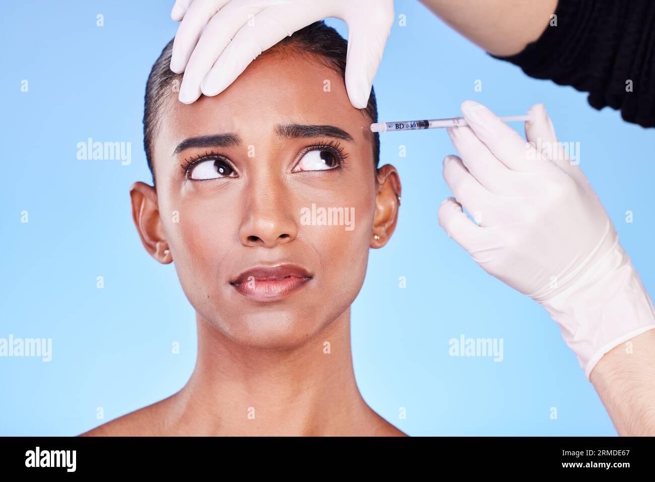 Injection, hands and face of Indian woman for plastic surgery ...