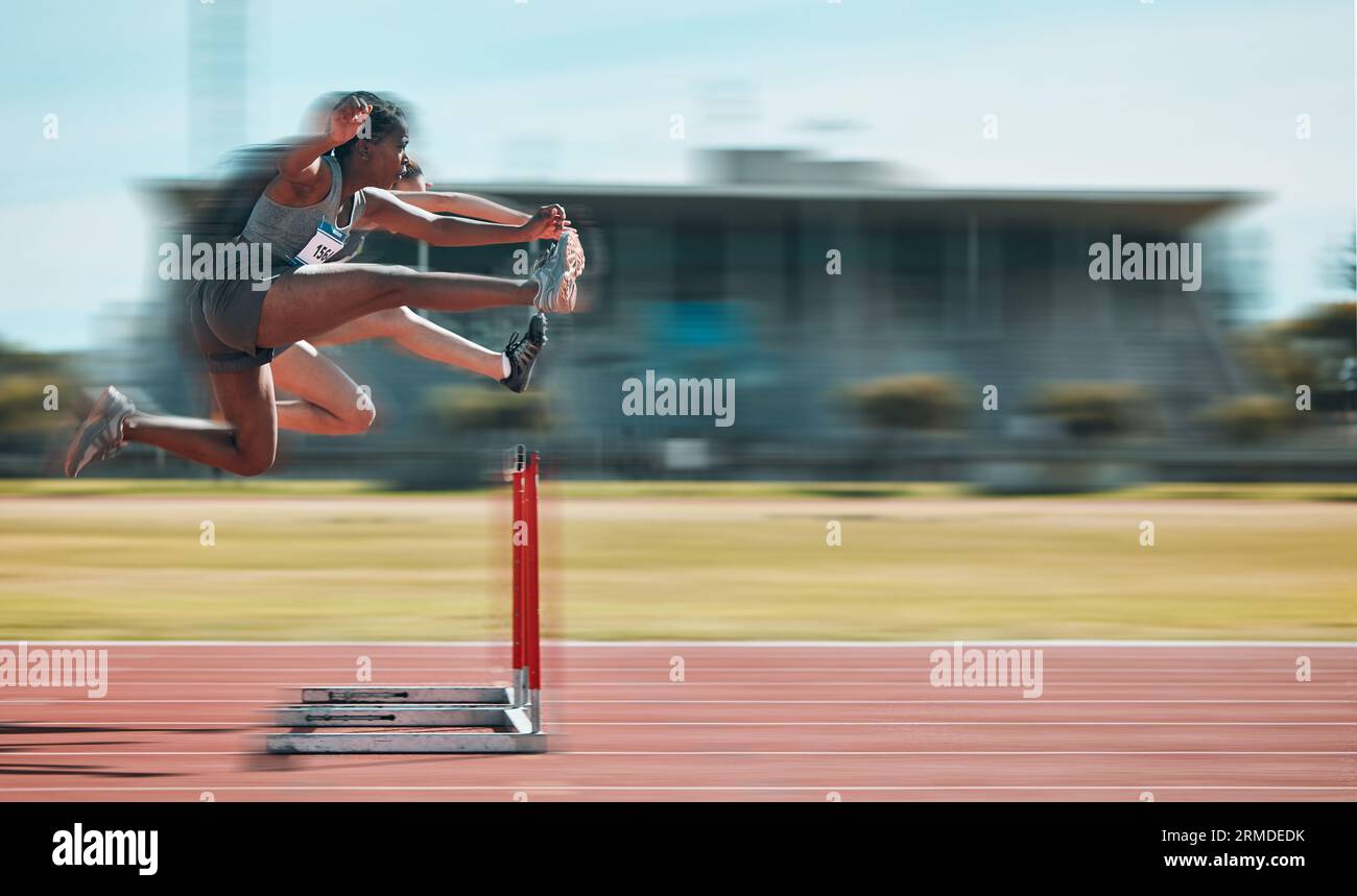 Girl jumping hurdle on running hi-res stock photography and images - Alamy