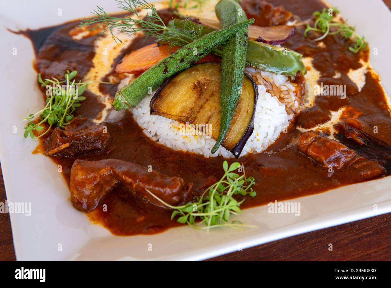 Japanese inspired curry dish with rice Stock Photo - Alamy