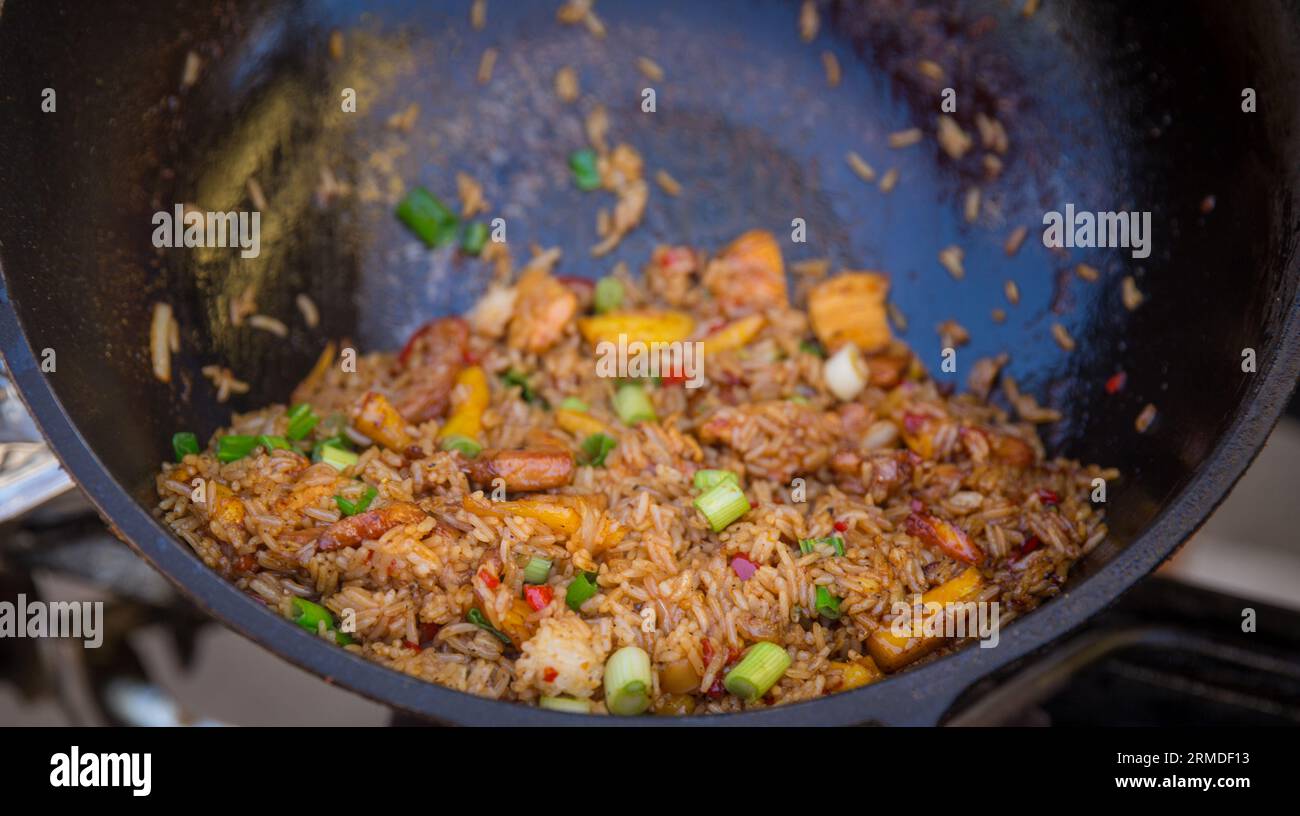 Puerto Rican Pineapple, pork and chicken fried rice Stock Photo - Alamy