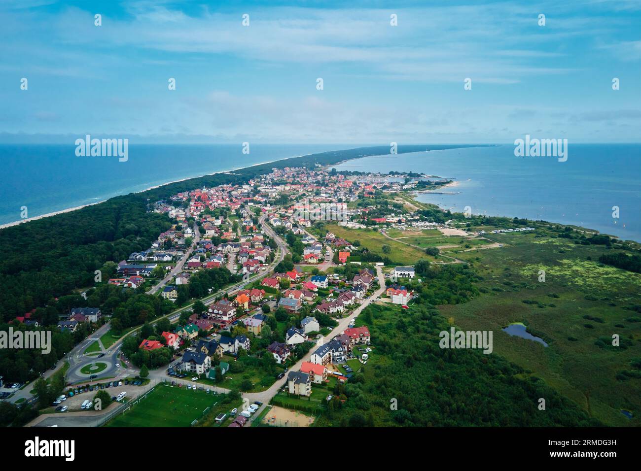 Birds eye view of sea landscape with sandy beach and Jastarnia city on ...