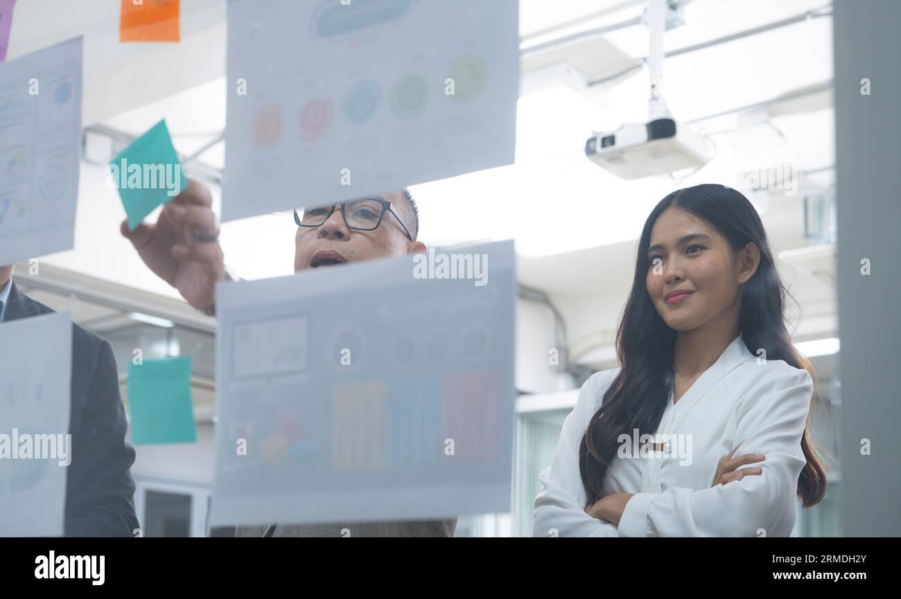 Office meeting presentation and brainstorming. Teamwork strategic ...