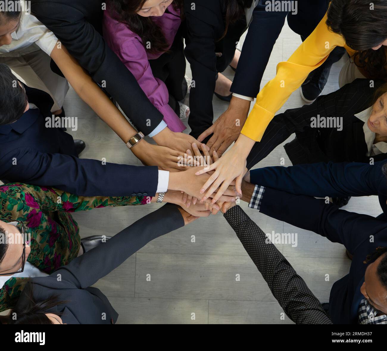 Team, teamwork, and unity concept. Diverse team putting hands together. Group of diverse ...