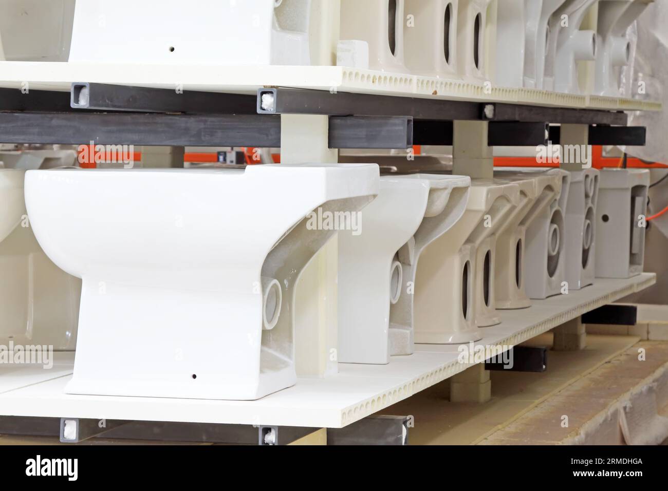 ceramic toilet semi finished products in a factory Stock Photo - Alamy
