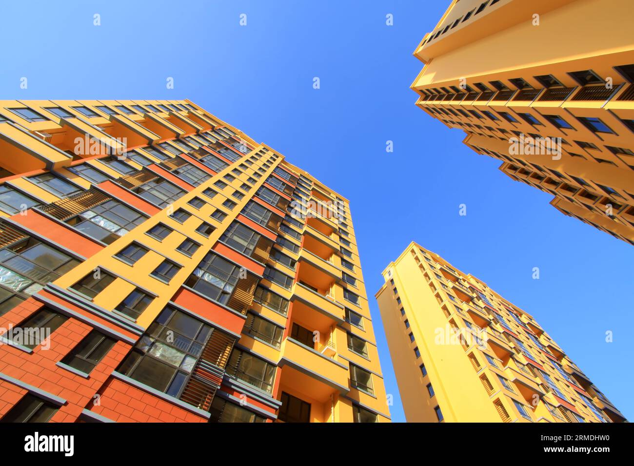 unfinished building, under the blu sky background Stock Photo - Alamy