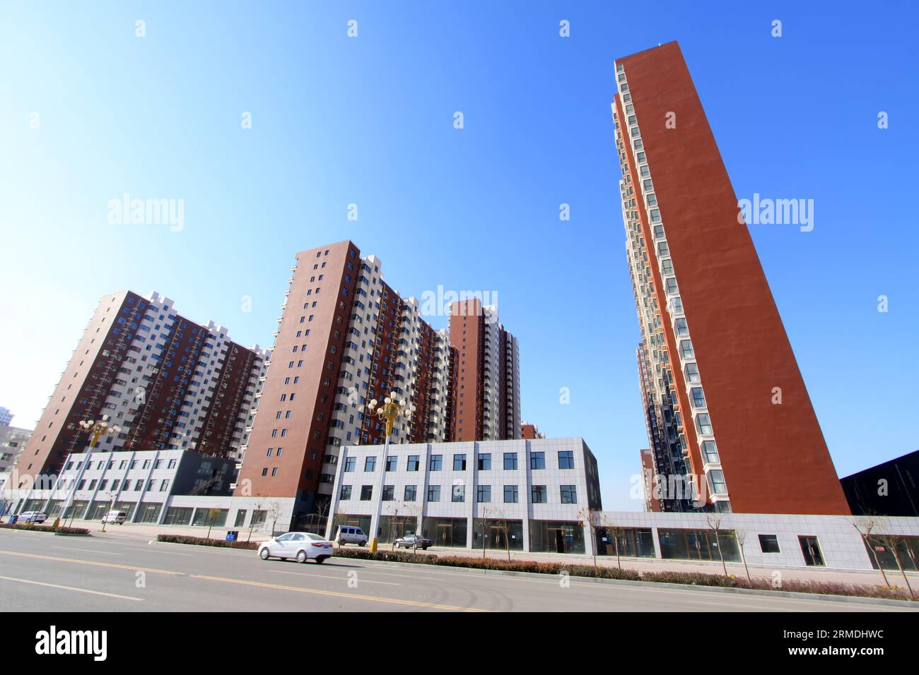 unfinished building, under the blu sky background Stock Photo - Alamy