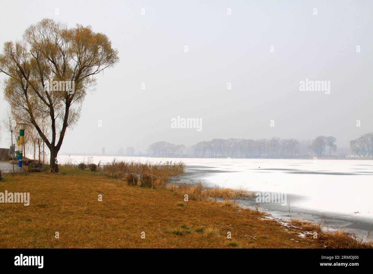 Frozen natural landscape at the side of the river, in winter, China ...