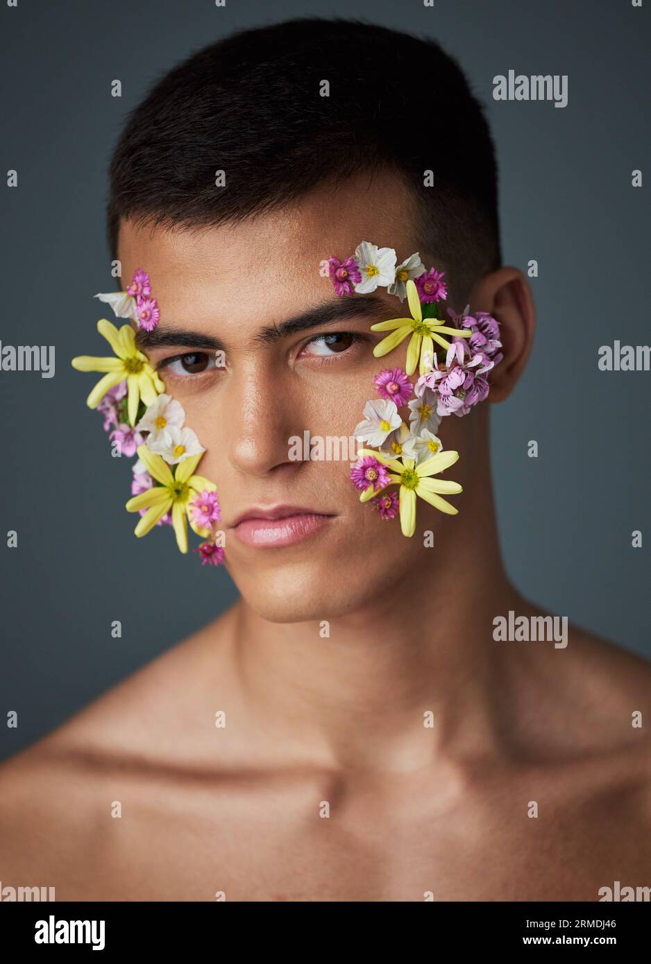 Portrait, man and flowers, beauty and natural, cosmetics and headshot ...