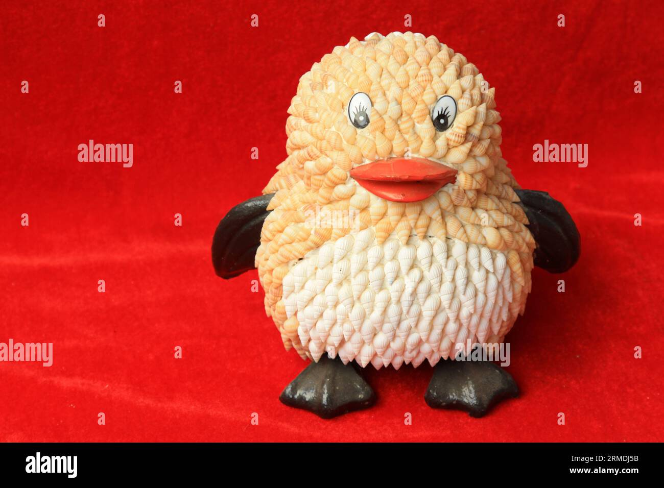 penguin model crafts in a market, made of shells Stock Photo - Alamy