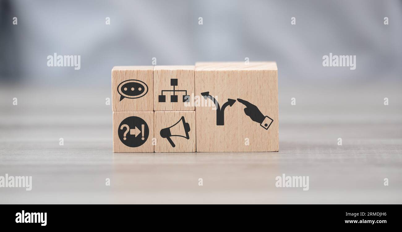 Wooden blocks with symbol of coaching concept Stock Photo - Alamy