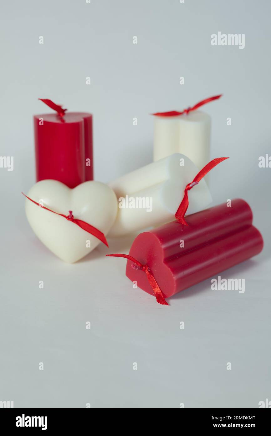 Candles with a red bow Stock Photo - Alamy