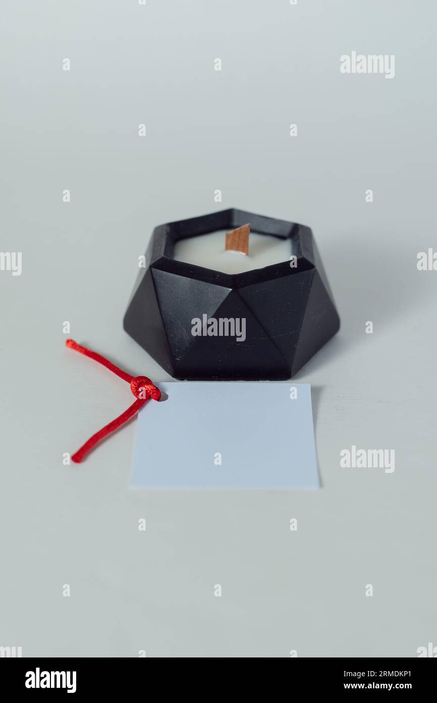 Candles with a red bow Stock Photo - Alamy