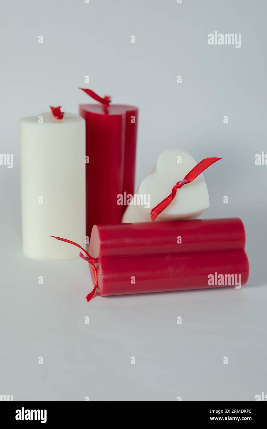 Candles with a red bow Stock Photo - Alamy