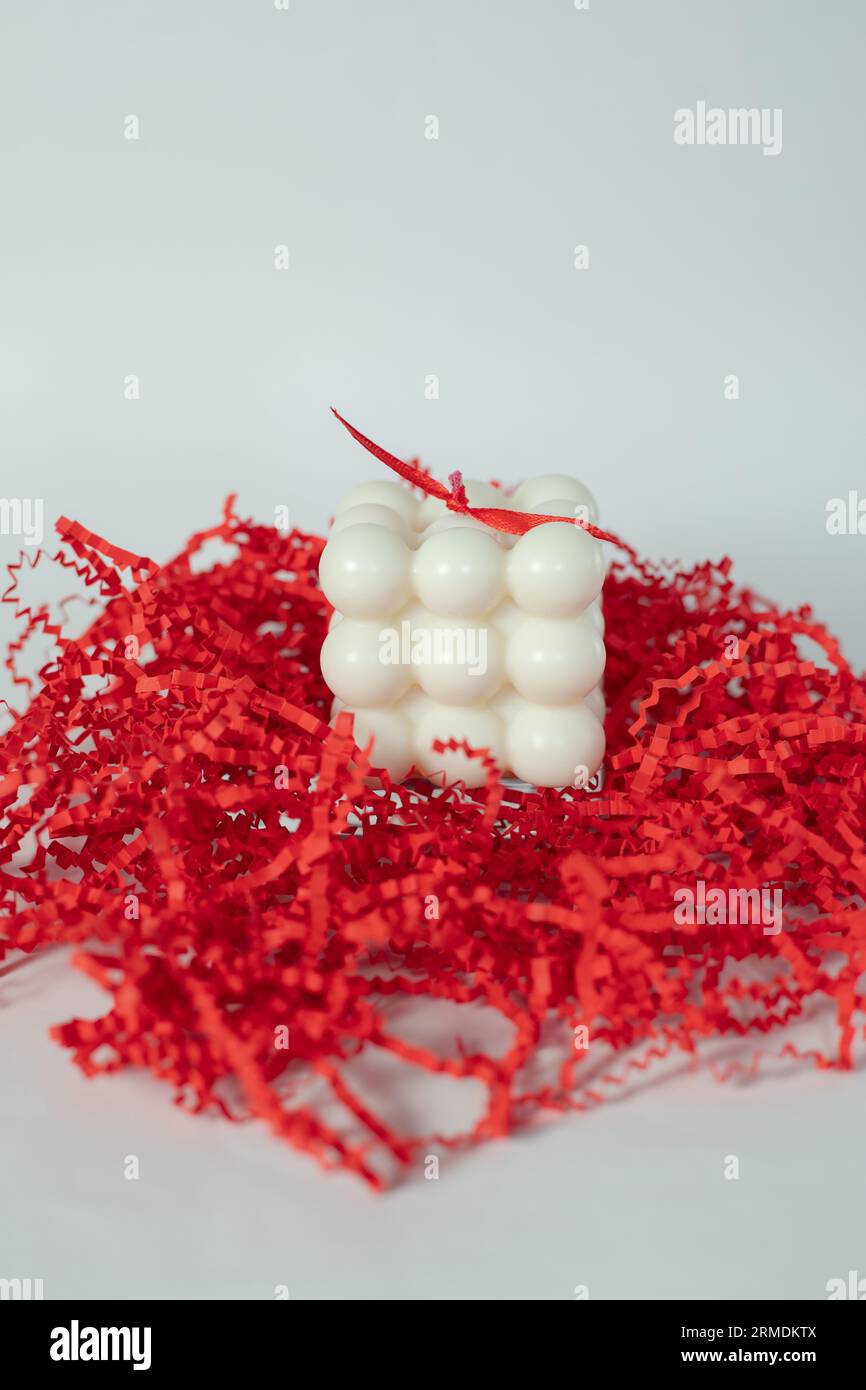 Candles with a red bow Stock Photo - Alamy