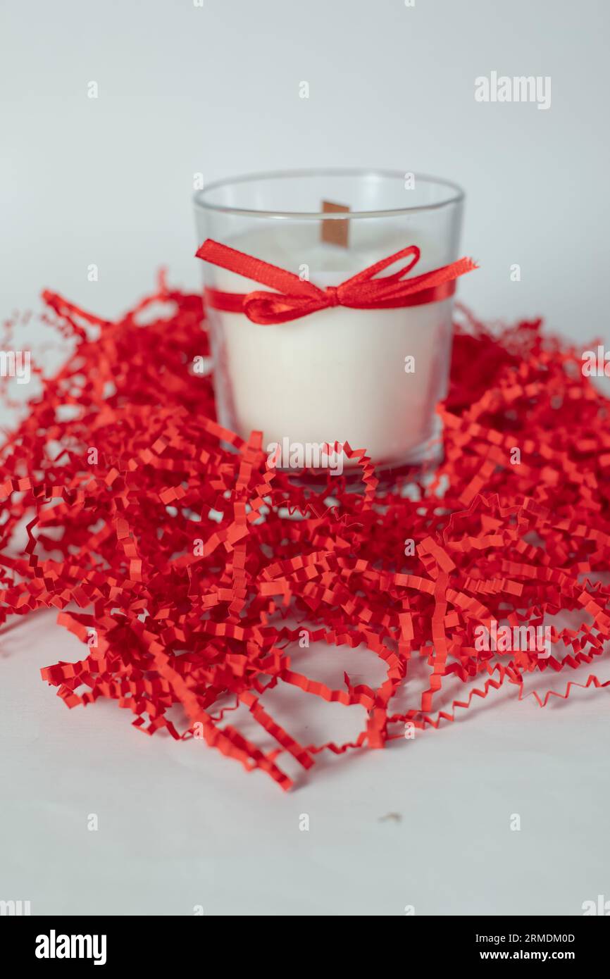 Candles with a red bow Stock Photo - Alamy