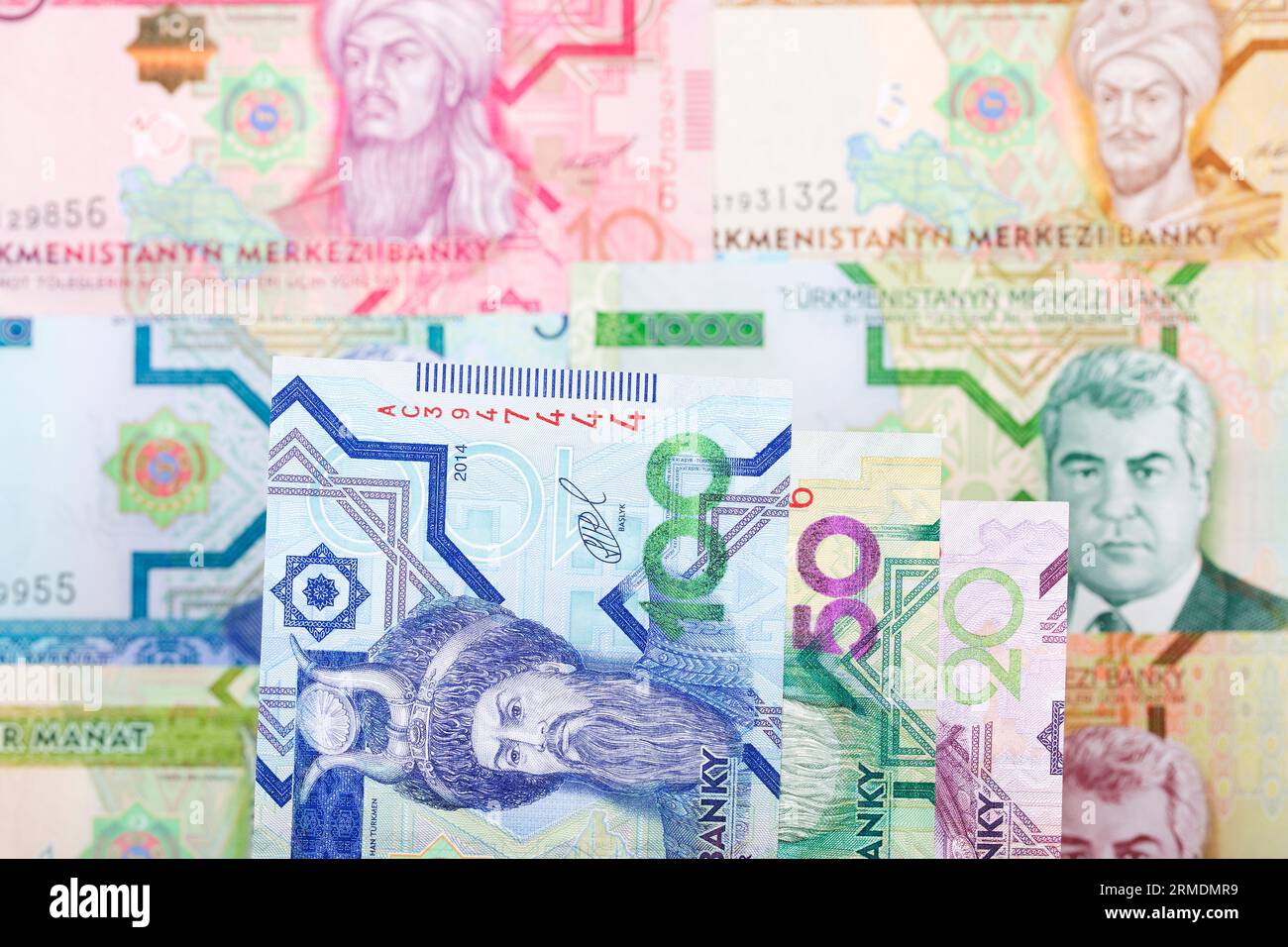 Turkmenistani money - manat a business background Stock Photo - Alamy