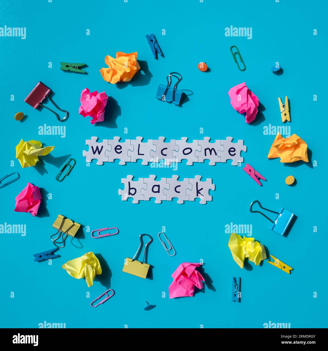 WELCOME BACK to school message inscription text on white puzzles on ...