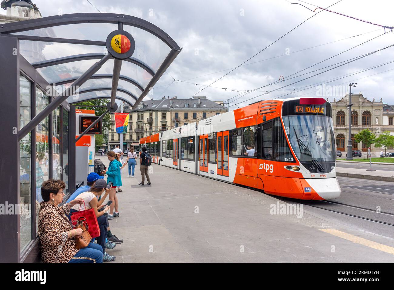 Tpg tram approaching stop, Place de Neuve, Vieille-Ville, Geneva ...