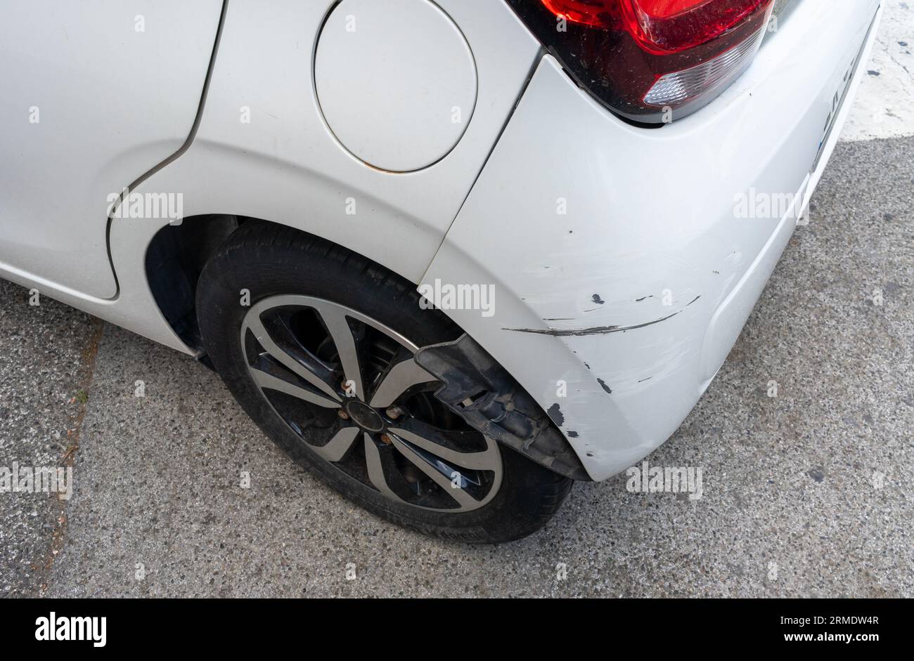 Paint scratches on a bumper of the white car Stock Photo - Alamy