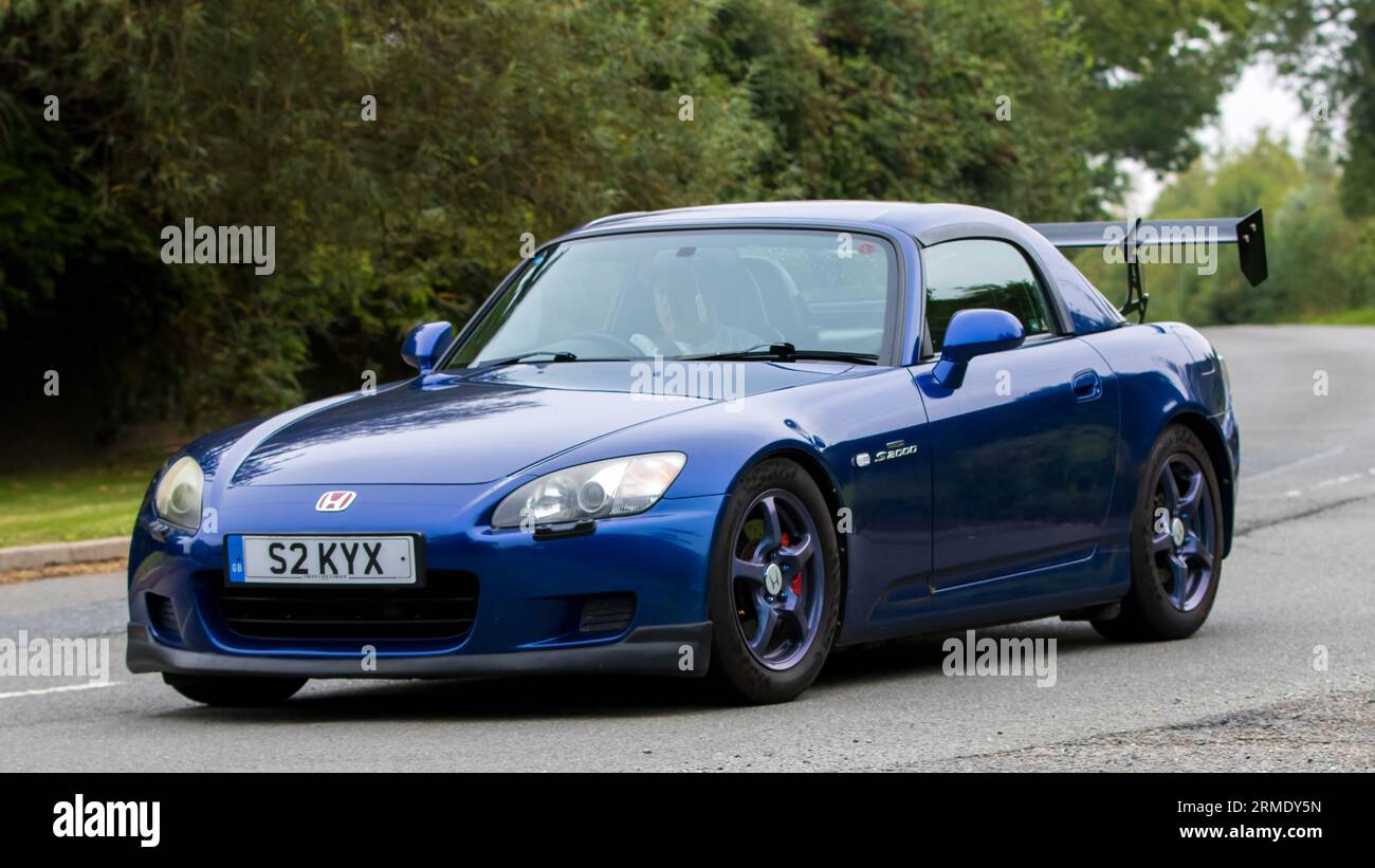 Whittlebury,Northants,UK -Aug 26th 2023: 2002 blue Honda S2000 sports car travelling on an ...