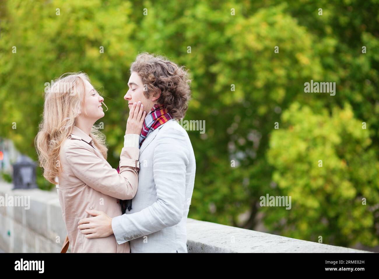 Happy young couple having a date Stock Photo - Alamy