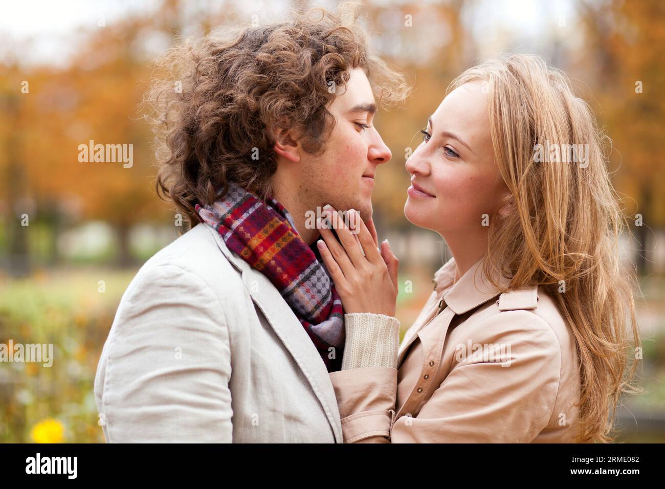 Romantic couple having a date at fall Stock Photo - Alamy