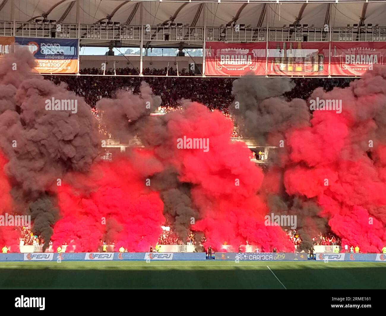 Red and black smoke in Maracana Stadium final soccer match Stock Photo ...